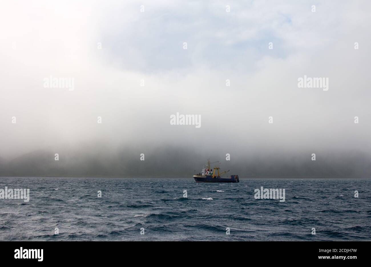 Fishing trawler at sea during storm hi-res stock photography and images ...