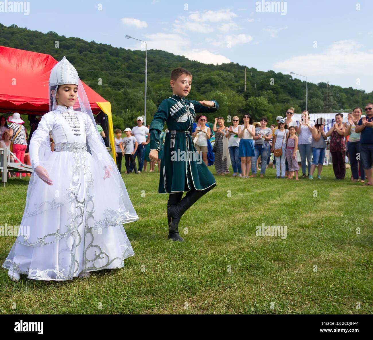DAKHOVSKY, RUSSIA - JULY 25 2015: The boy and the girl in beautiful ...