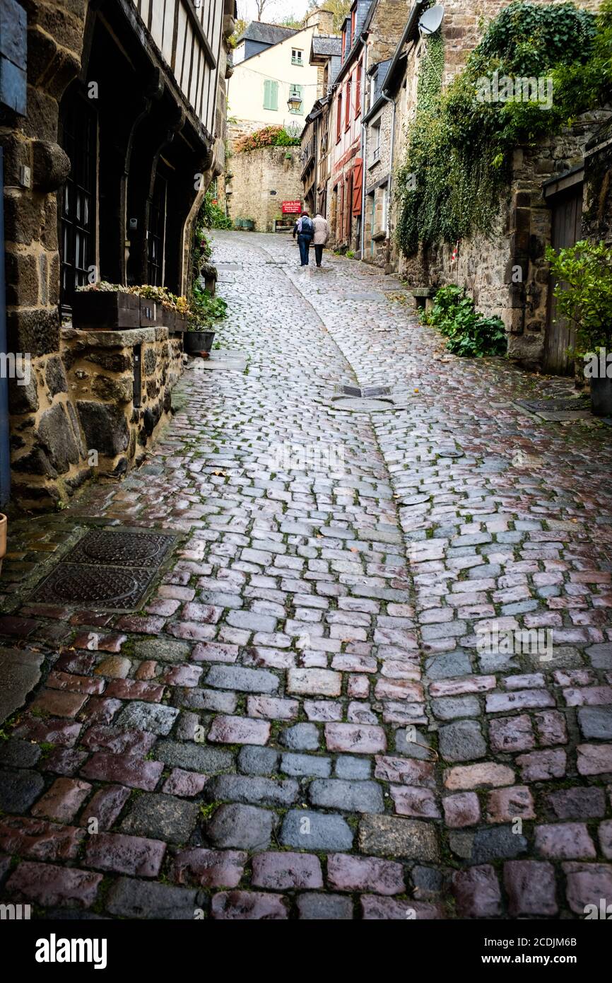 The old Breton city of Dinan with is cobblestone streets and stone ...