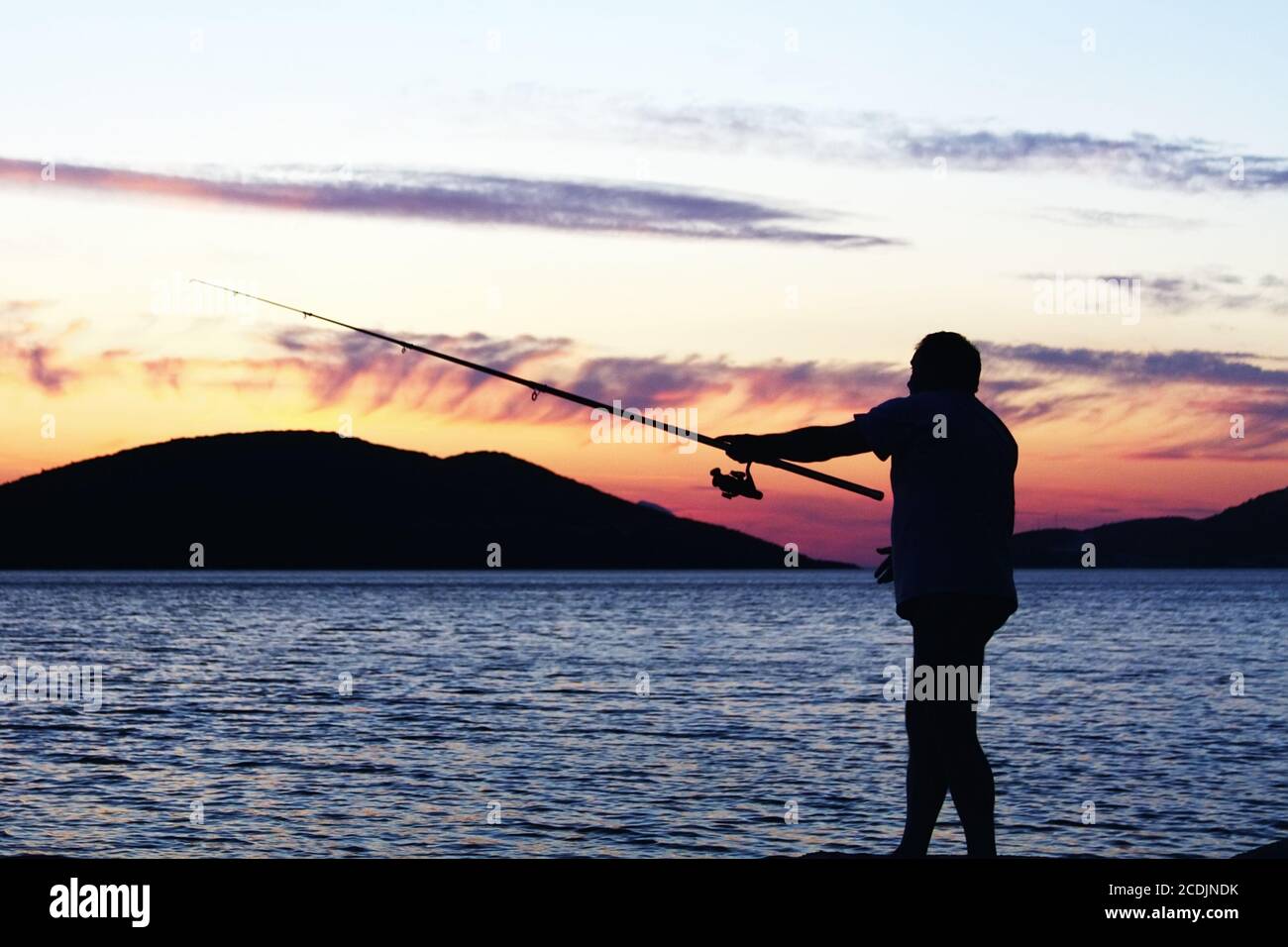 Horizon sunset fishing silhouette hi-res stock photography and images ...