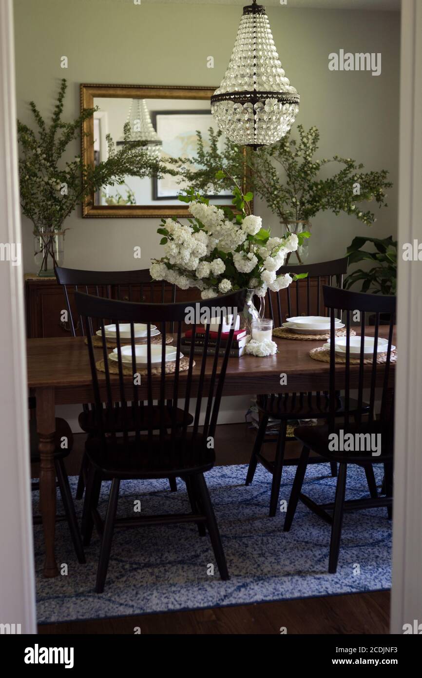 Dining table chairs centerpiece hi-res stock photography and images - Alamy