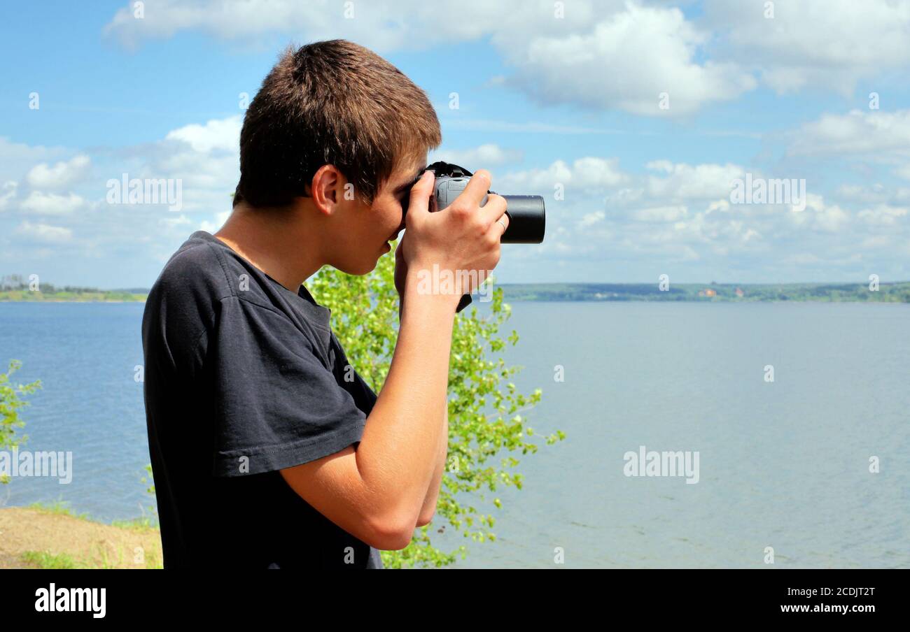 Young man camera hi-res stock photography and images - Alamy
