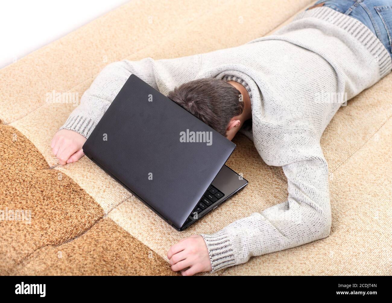 teenager sleeping with notebook Stock Photo - Alamy