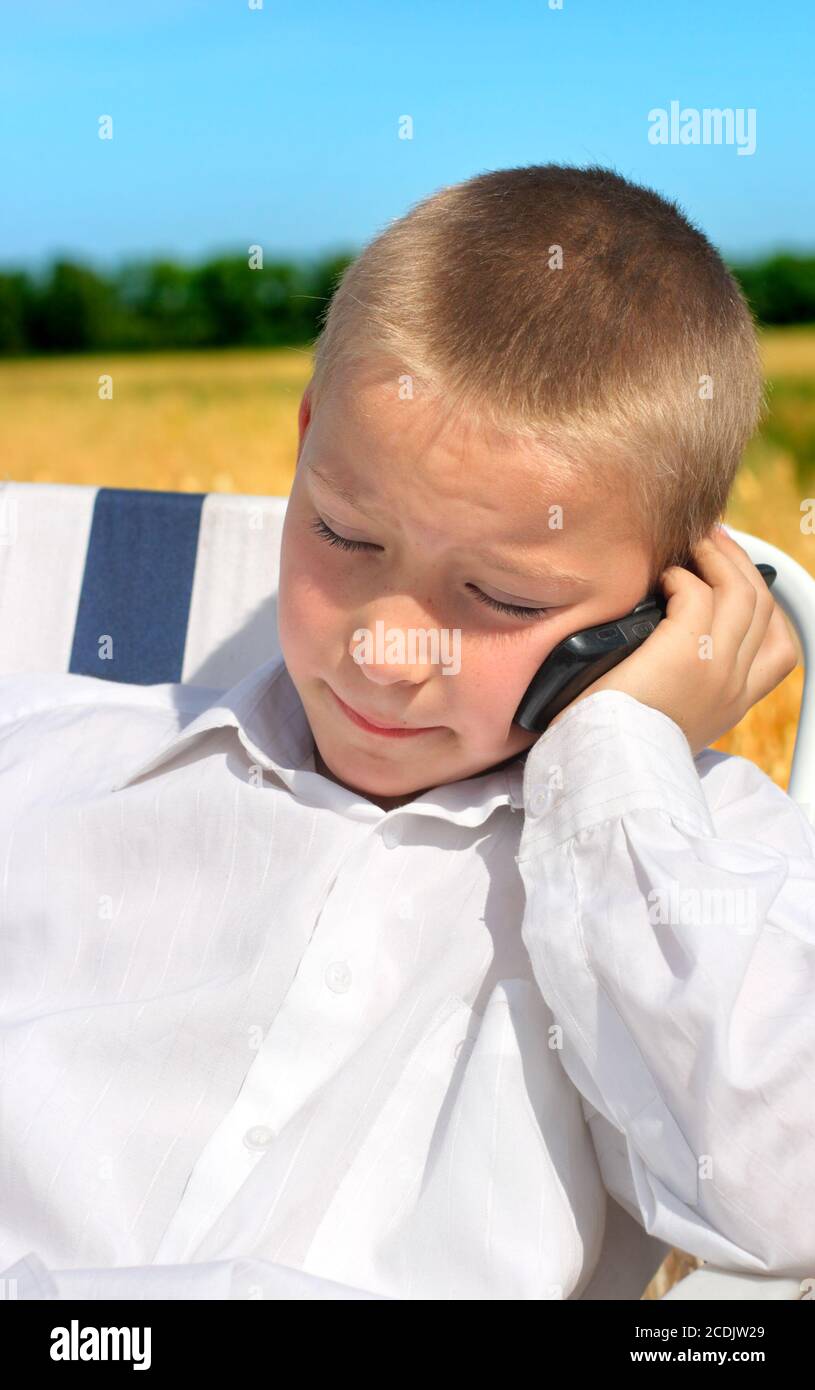 Child sad talking hi-res stock photography and images - Alamy