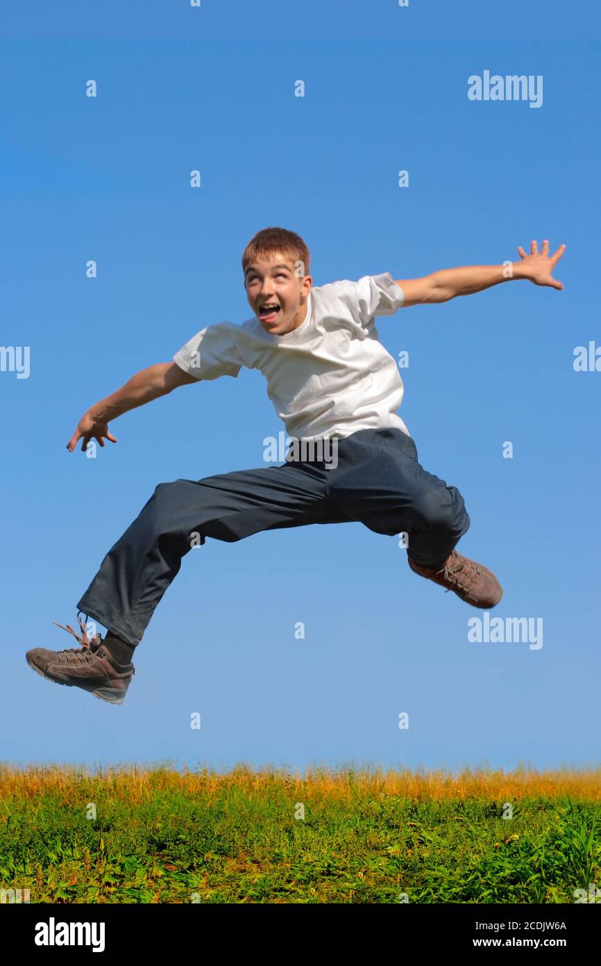 One boy jumping hi-res stock photography and images - Alamy