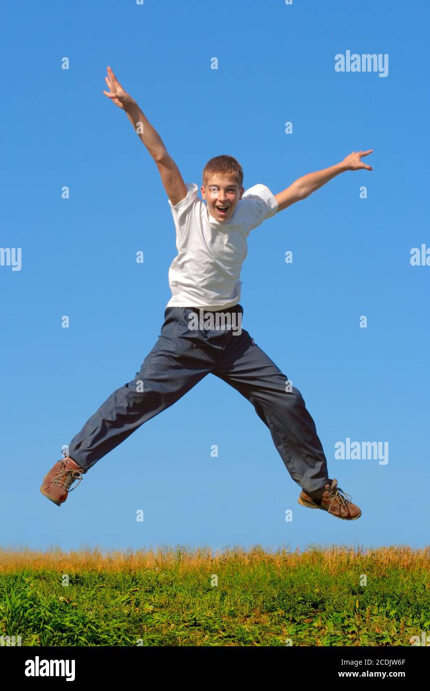 One boy jumping hi-res stock photography and images - Alamy