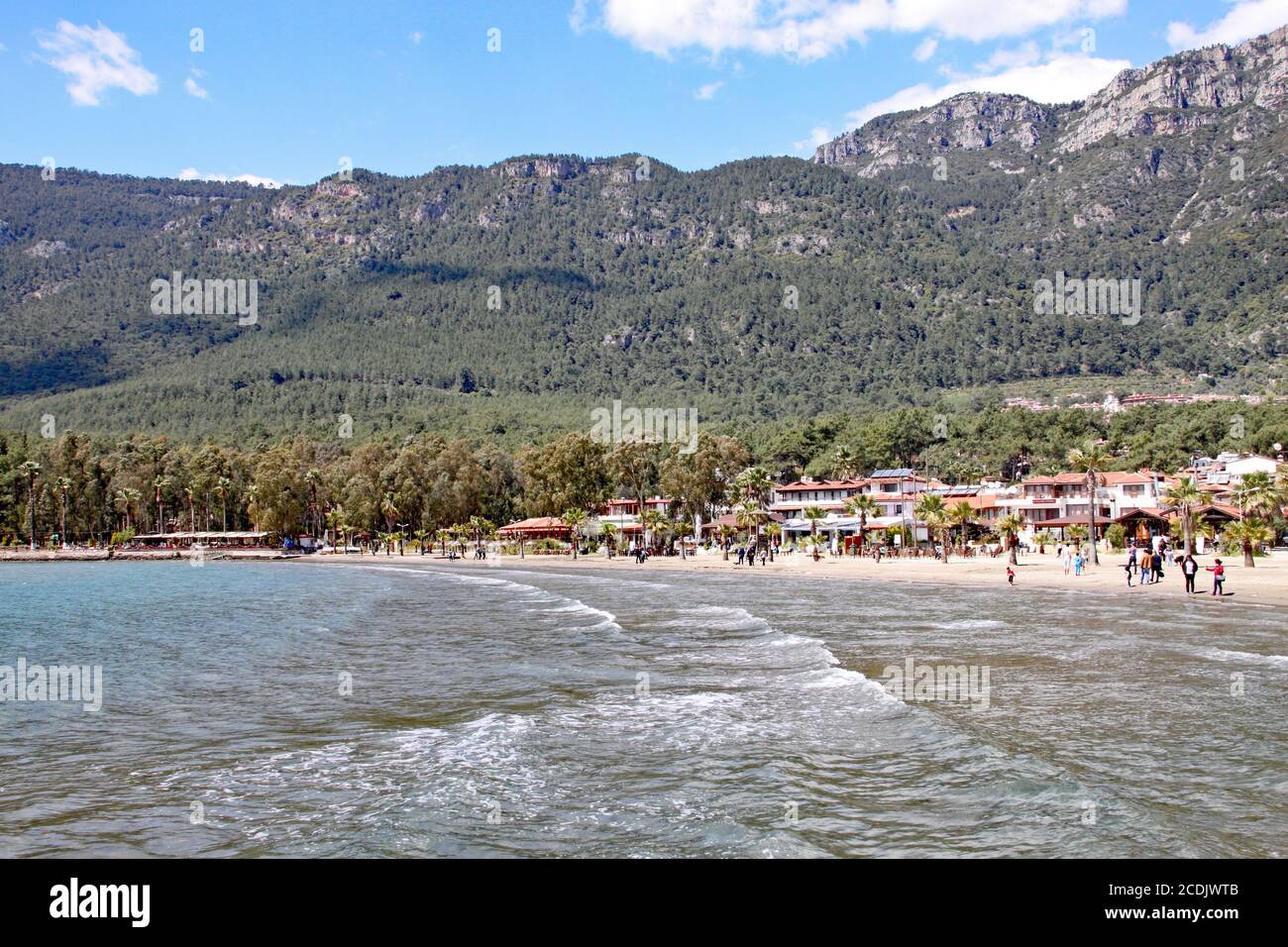 Restful beach scene in Turkey. Mountains shadow an idyllic bay Stock ...