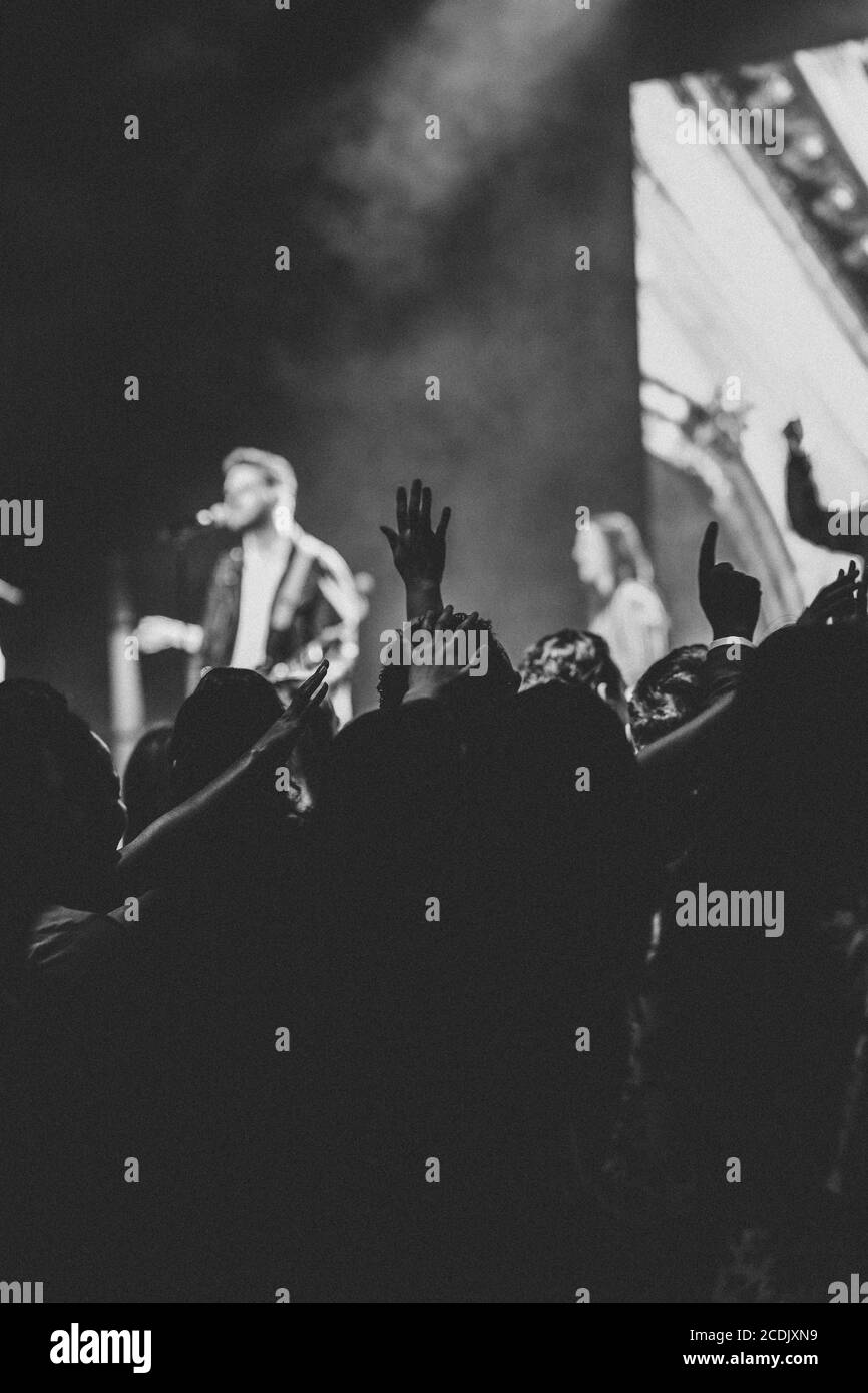 Raised a hand Black and White Stock Photos & Images - Alamy