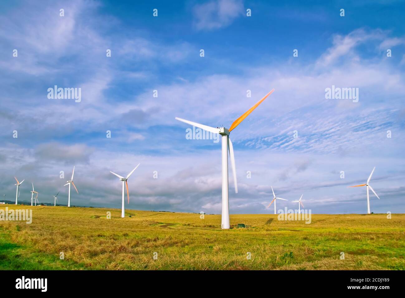 Windmills under sky Stock Photo - Alamy