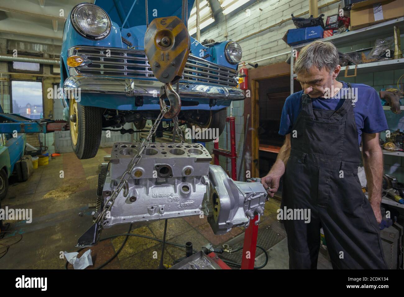 SAINT PETERSBURG, RUSSIA - AUGUST 03, 2020: A car mechanic joins the ...