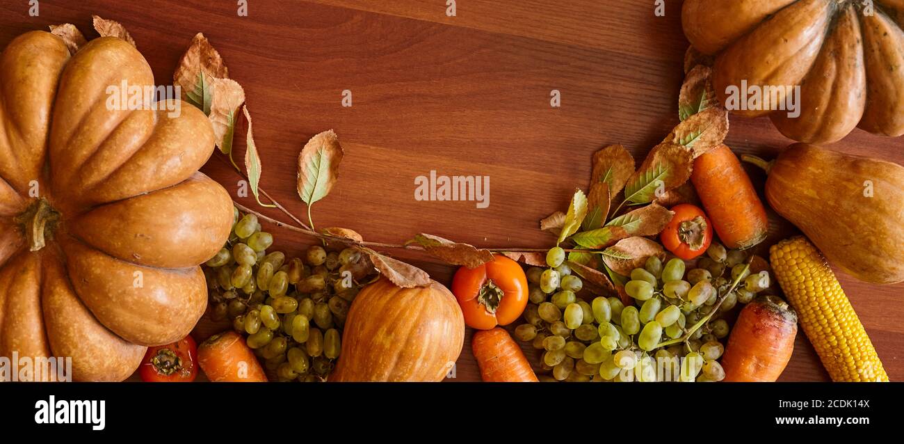 Autumn background with pumpkins and autumn fruits with copy space. Fall ...
