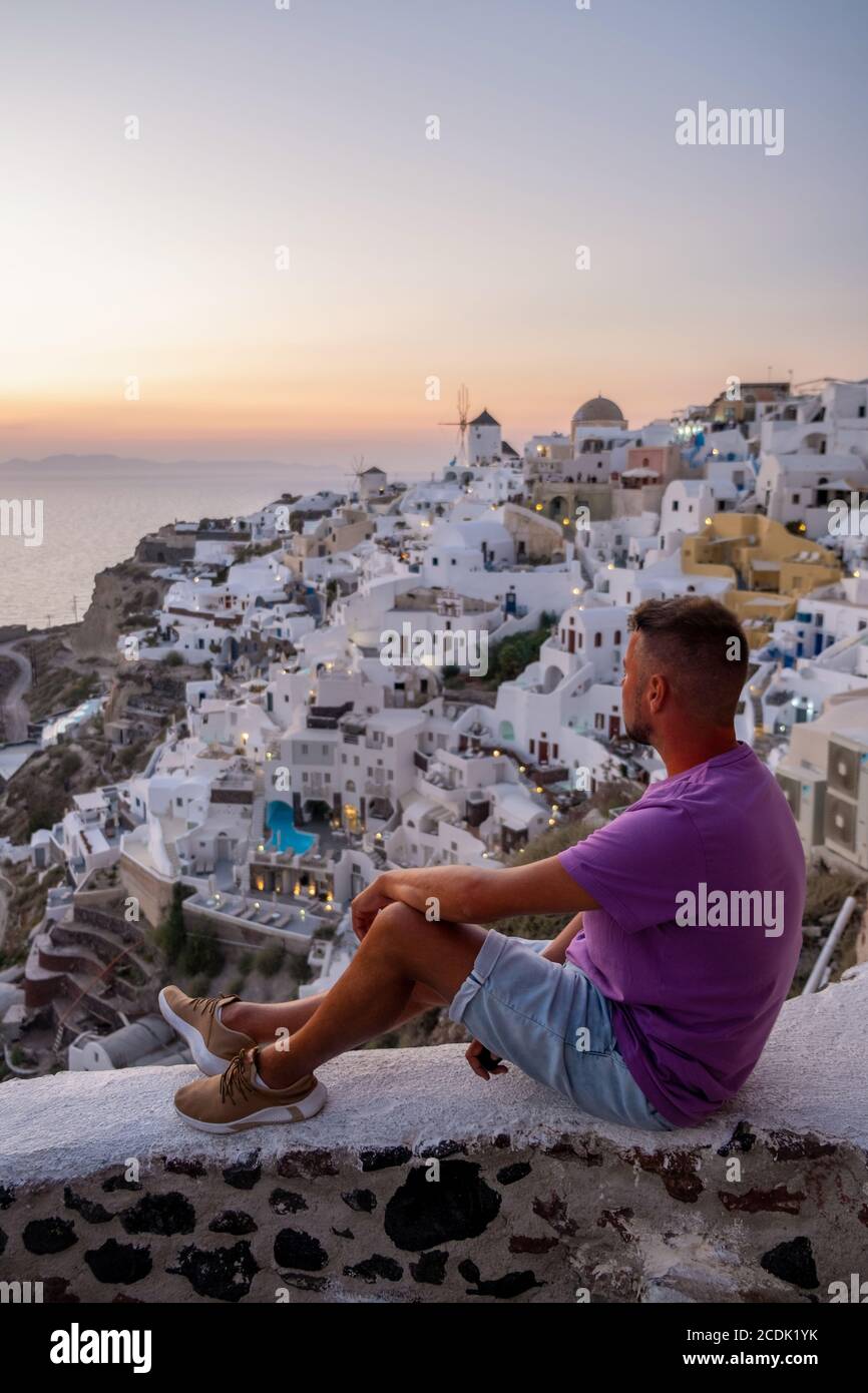 Santorini Greece, guy on vacation in Greece, young men on a luxury ...