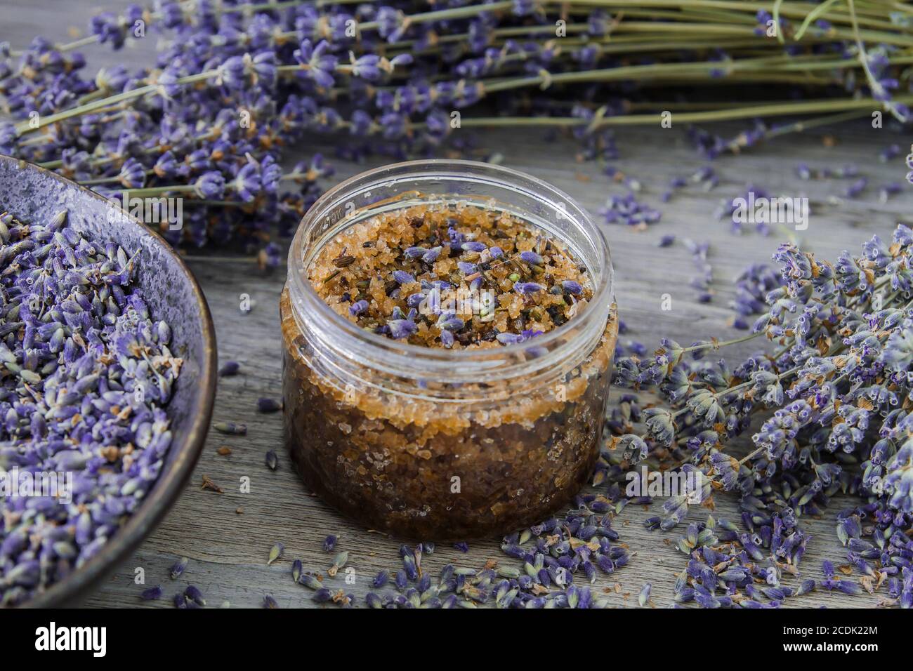Natural exfoliant with lavender dried flowers, brown sugar and ...