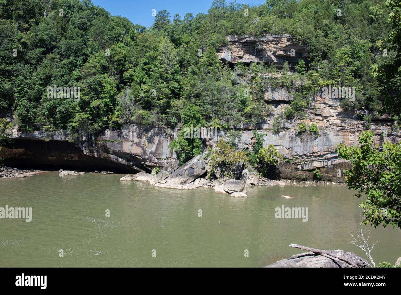 Rugged rocks below cliffs hi-res stock photography and images - Alamy
