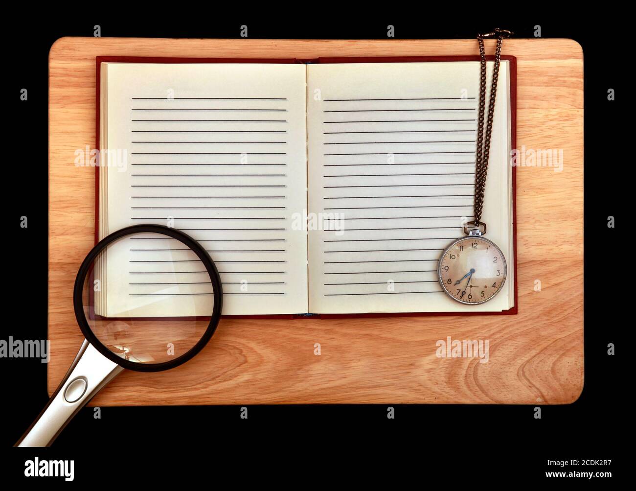 Writing Pad and Loupe and Watch Stock Photo - Alamy