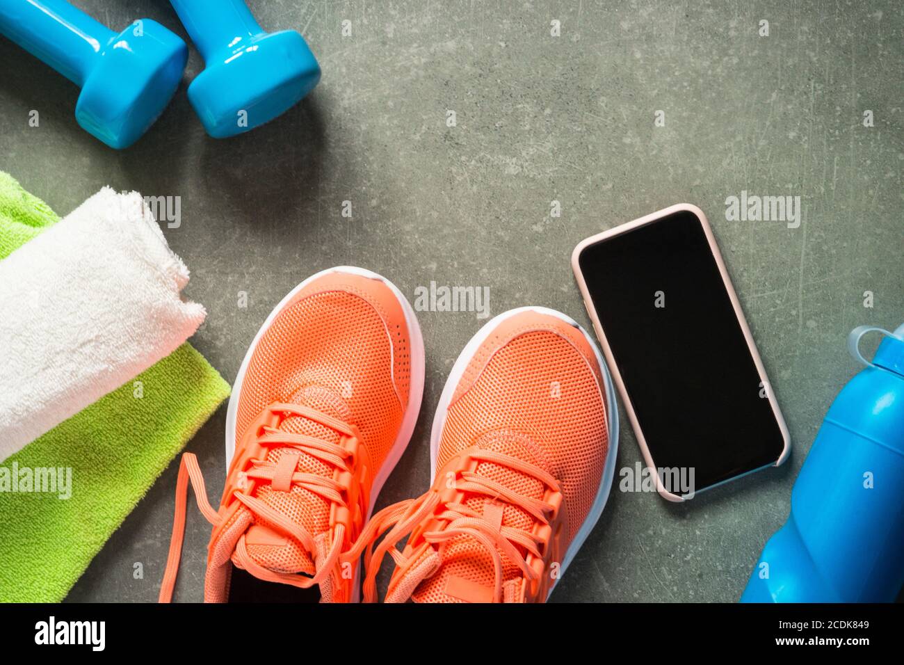 Fitness equipment at stone background top view Stock Photo - Alamy