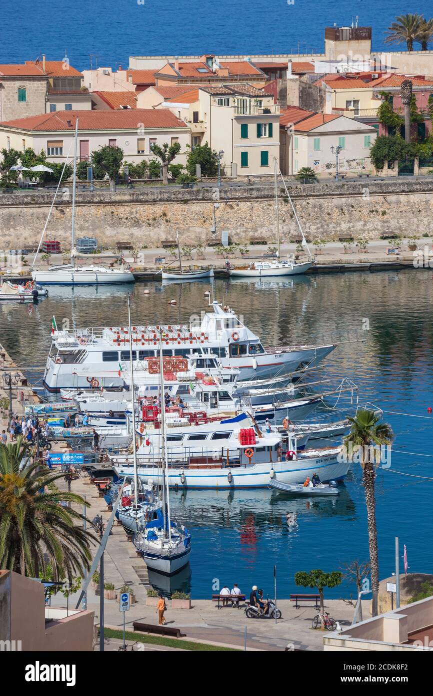 Italy, Sardinia, Alghero, View of marina and old town Stock Photo - Alamy