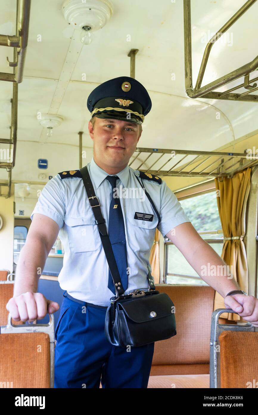 Old fashioned train conductor hi-res stock photography and images - Alamy