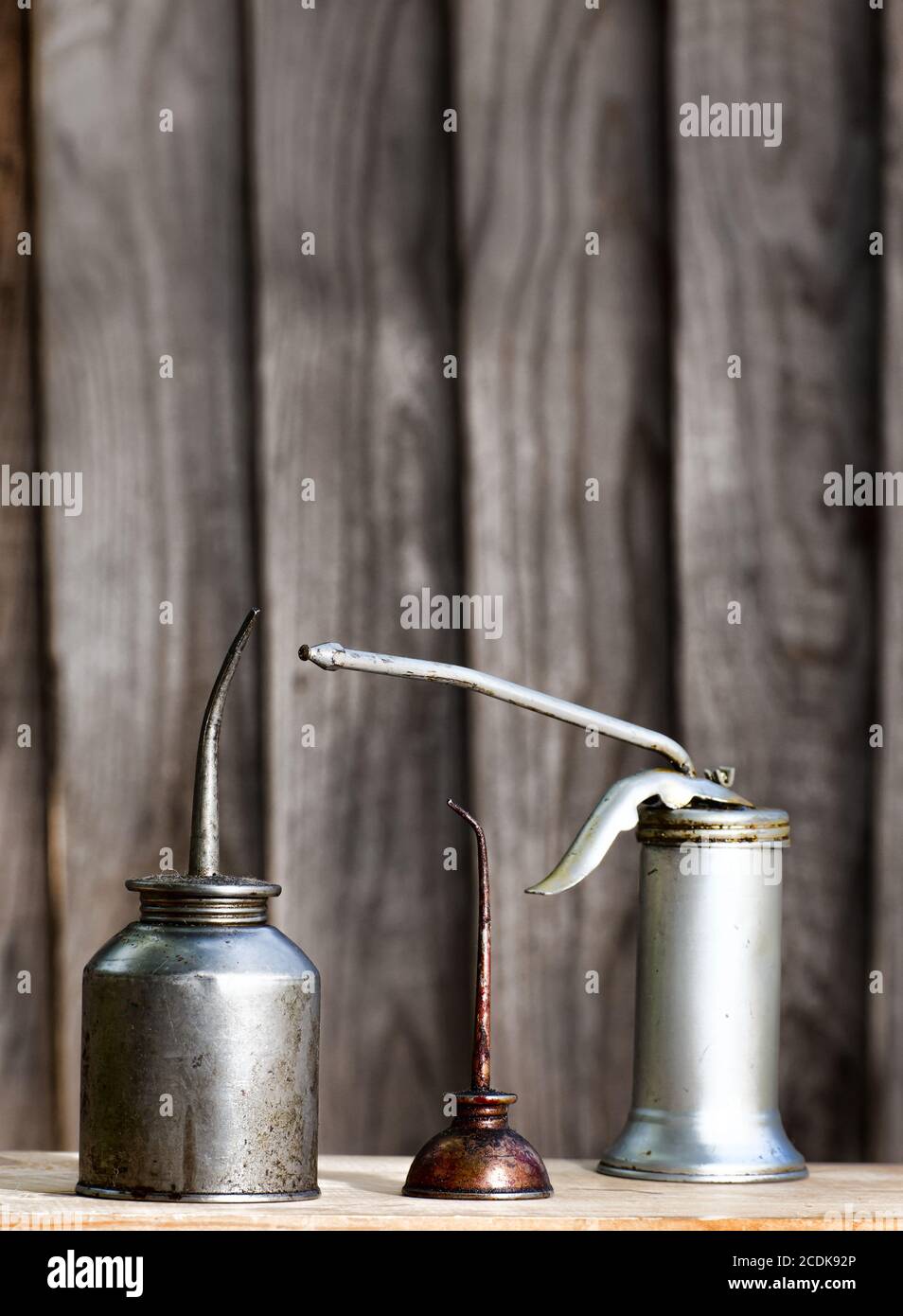 Three Oil Cans Stock Photo - Alamy