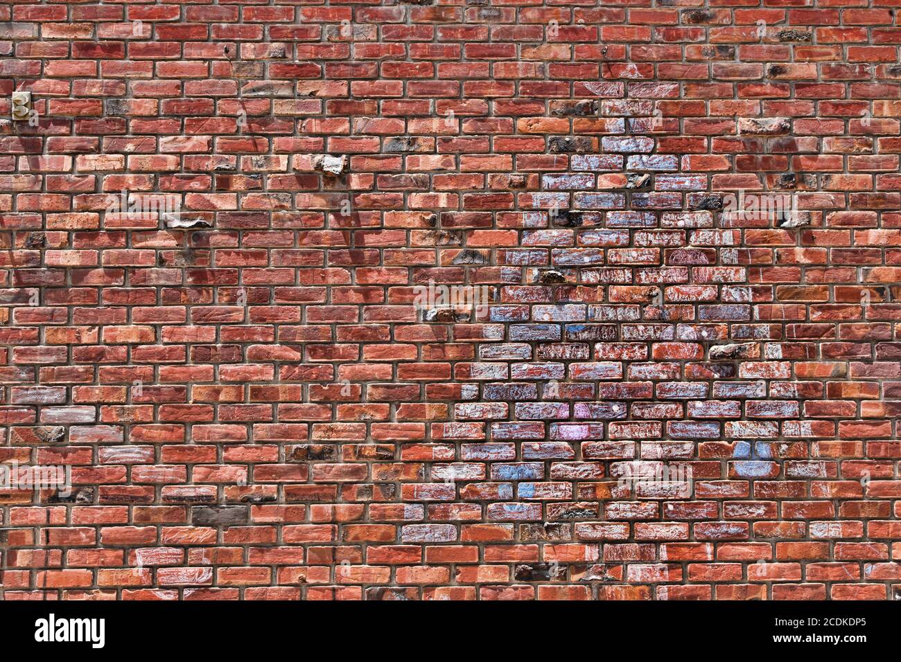 Multi-Color Red Brick Wall Background Stock Photo - Alamy