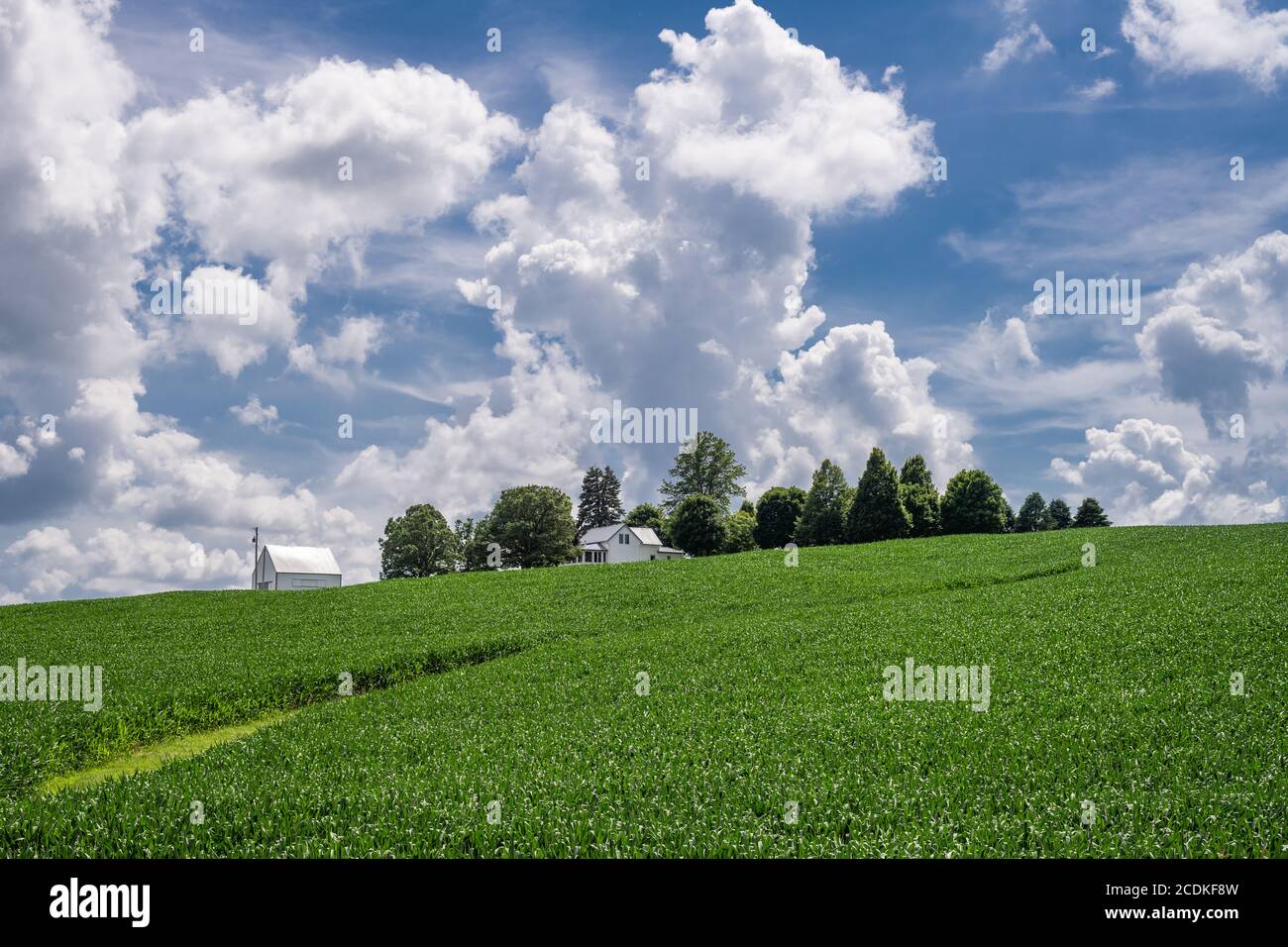 Dramatic clouds above a farmstead Stock Photo - Alamy