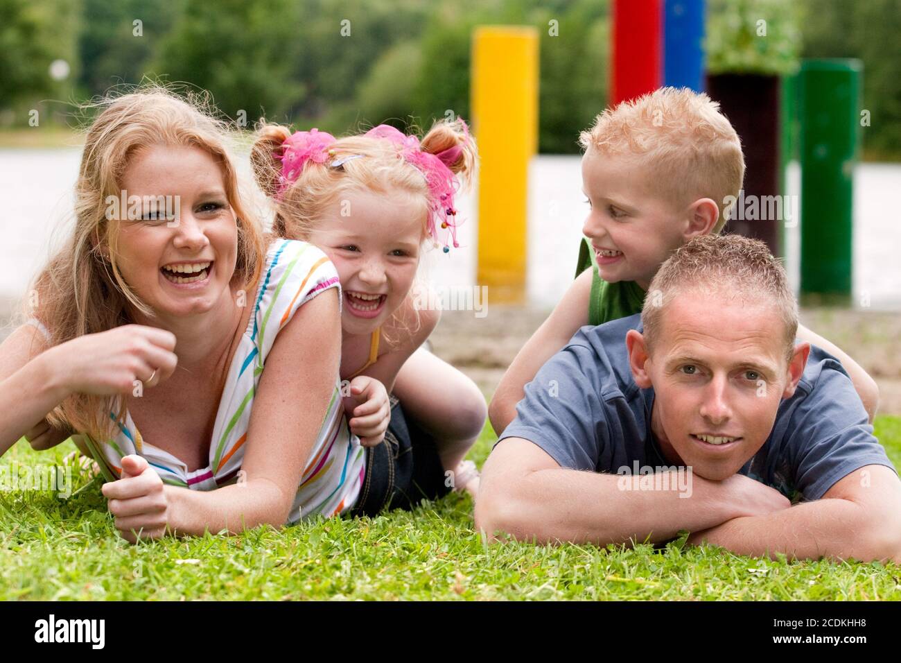 Happy colorfull family Stock Photo - Alamy