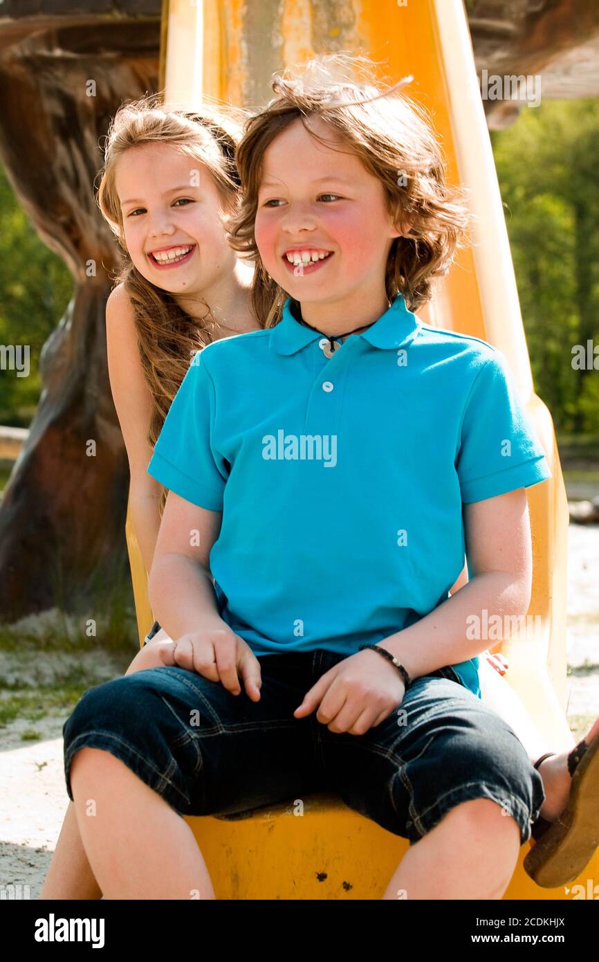 Take a slide together Stock Photo - Alamy