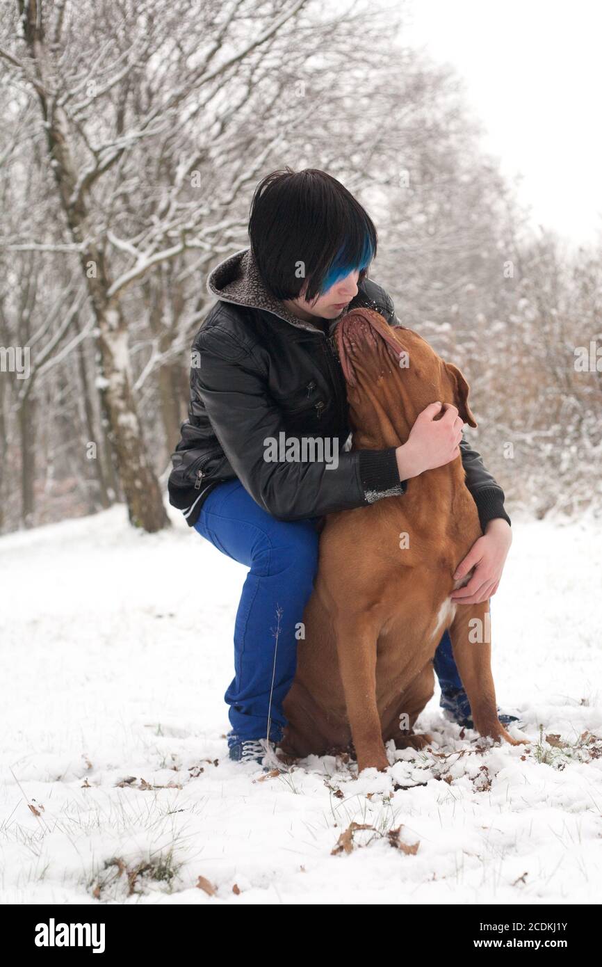 Cuddling his dog hi-res stock photography and images - Alamy