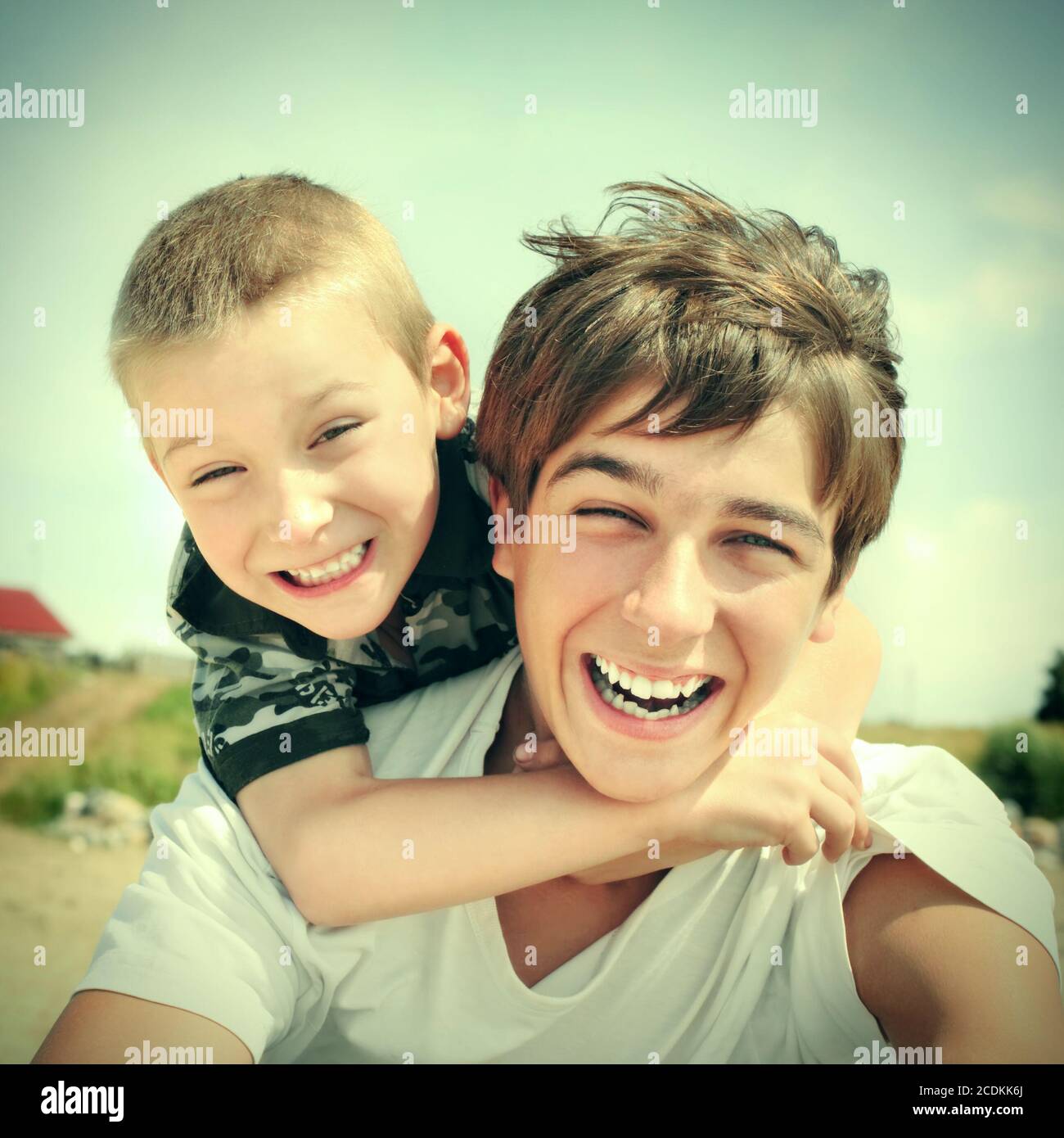 Happy Brothers outdoor Stock Photo - Alamy