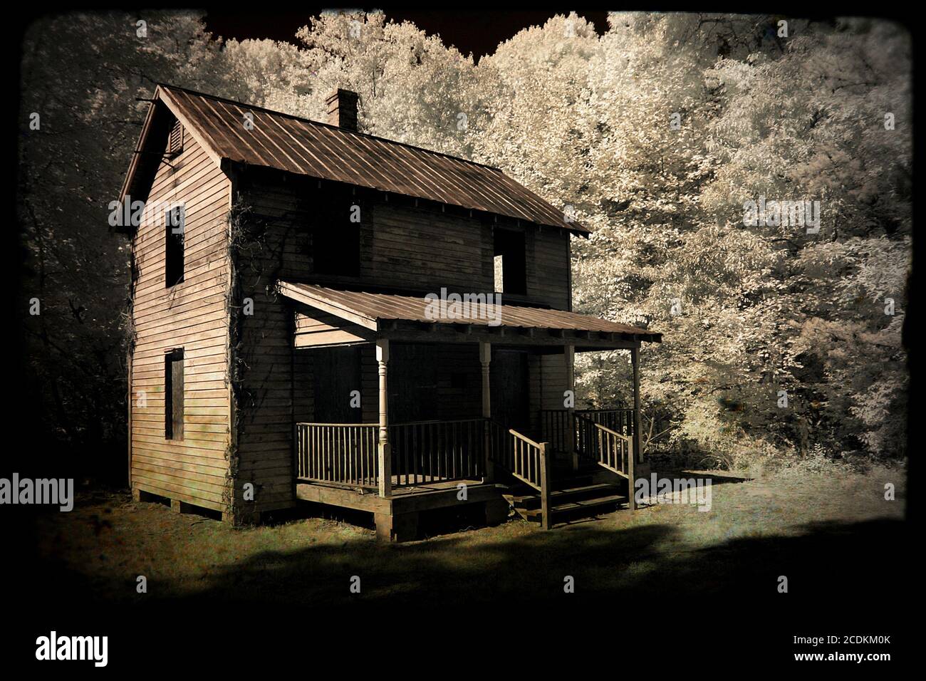 An uninviting house in the woods Stock Photo - Alamy