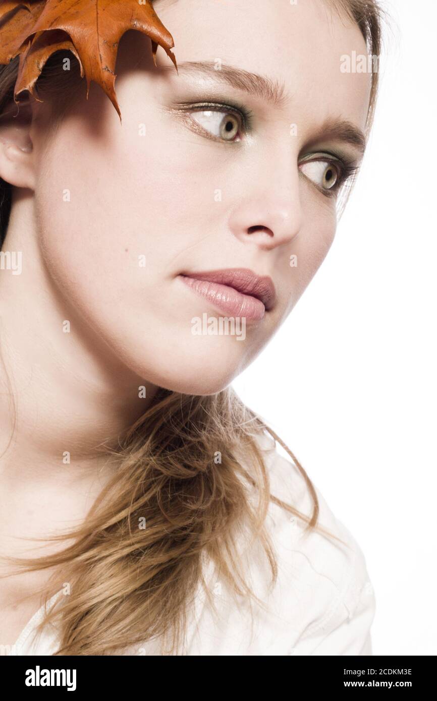 Model with autumn coloured leaf Stock Photo - Alamy