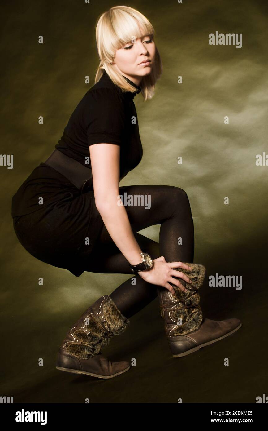 Boots pose hi-res stock photography and images - Alamy