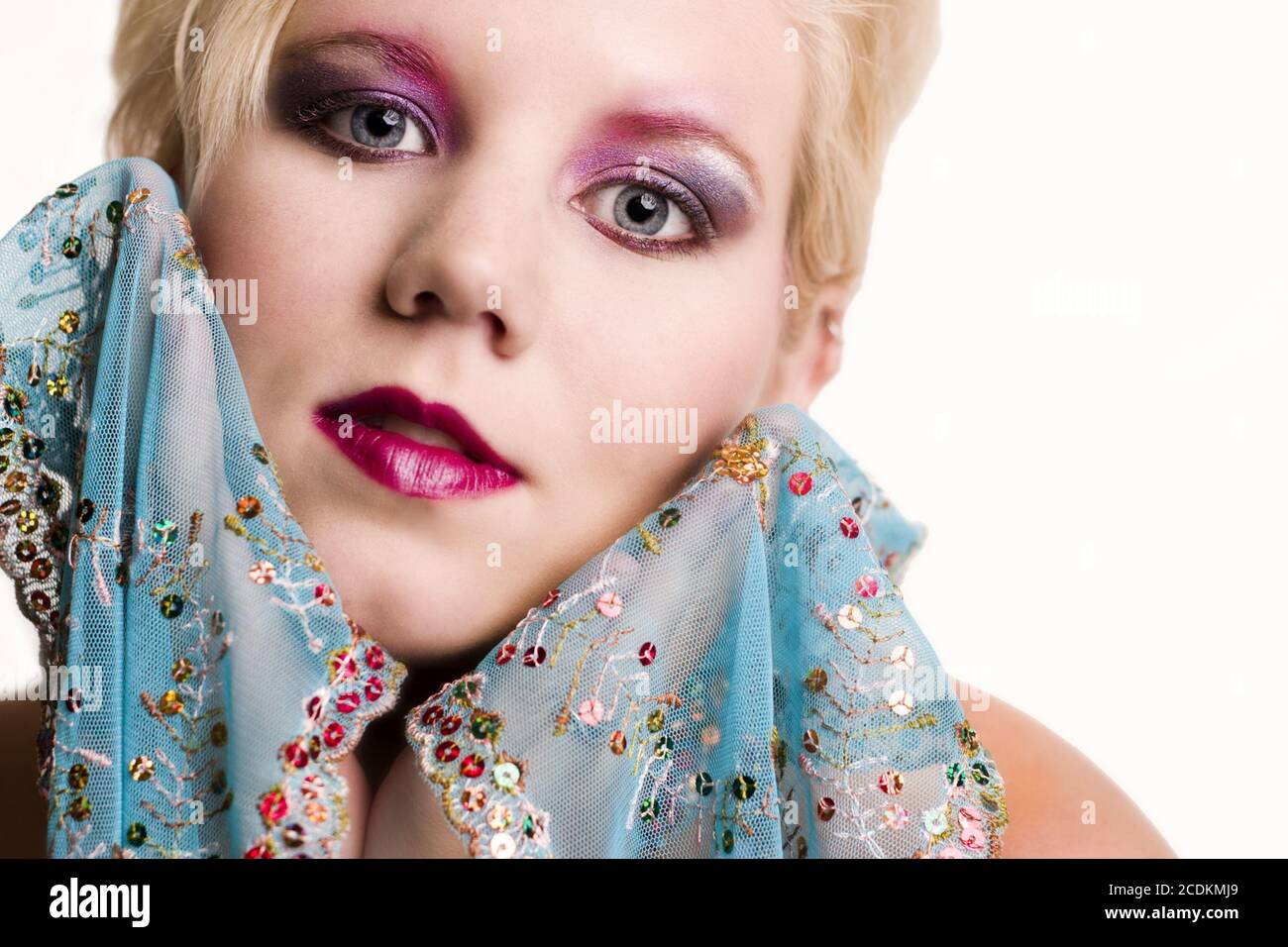 Woman with white silk scarf hi-res stock photography and images - Alamy