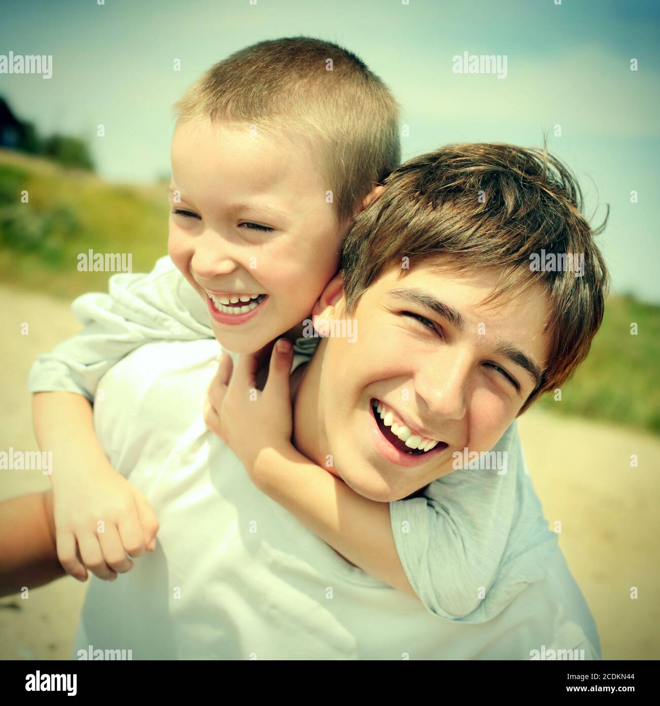Brothers embrace hi-res stock photography and images - Alamy