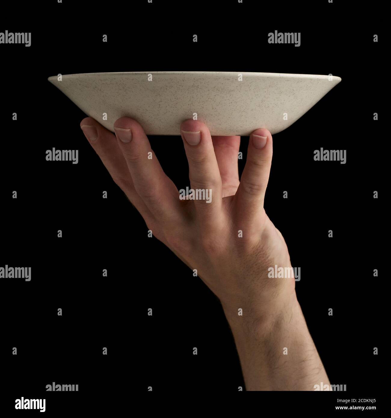 Hand holding a Dish Stock Photo - Alamy