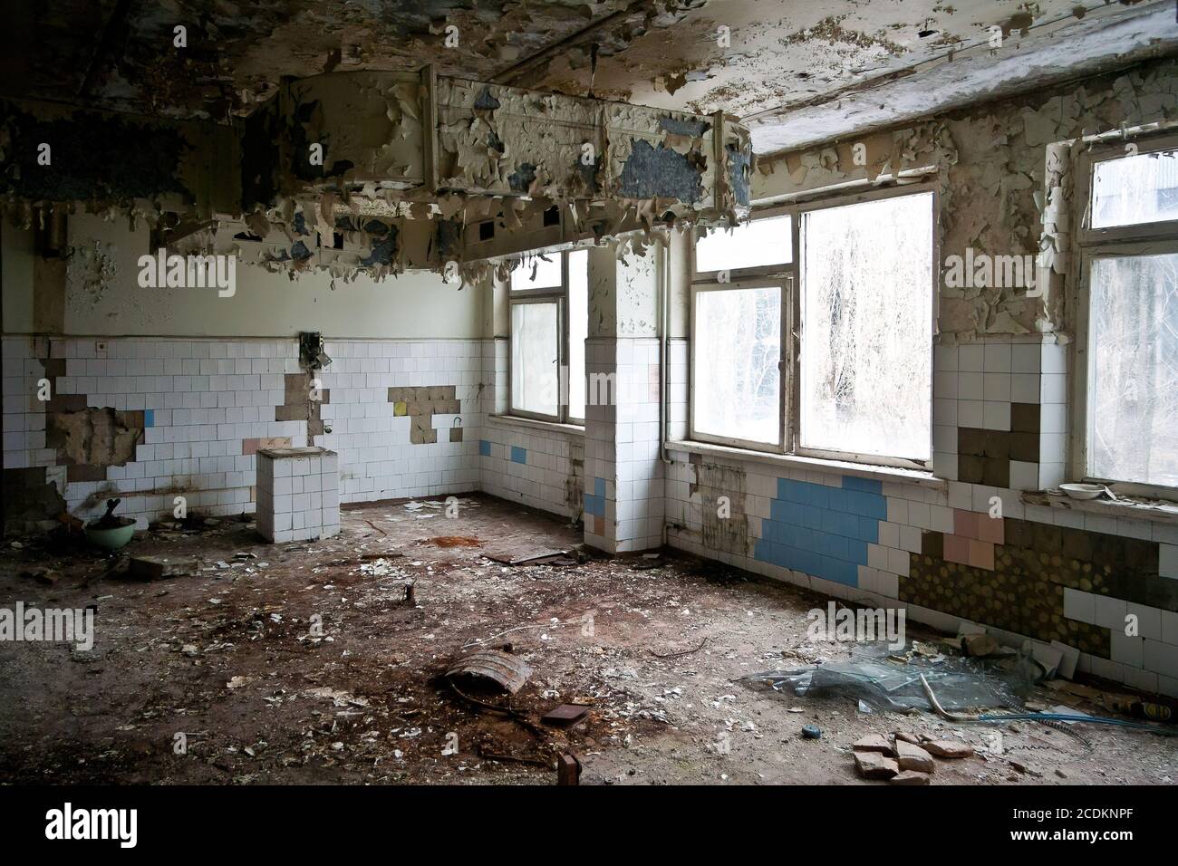 Abandoned and ruined kitchen of closed factory canteen or restaurant ...