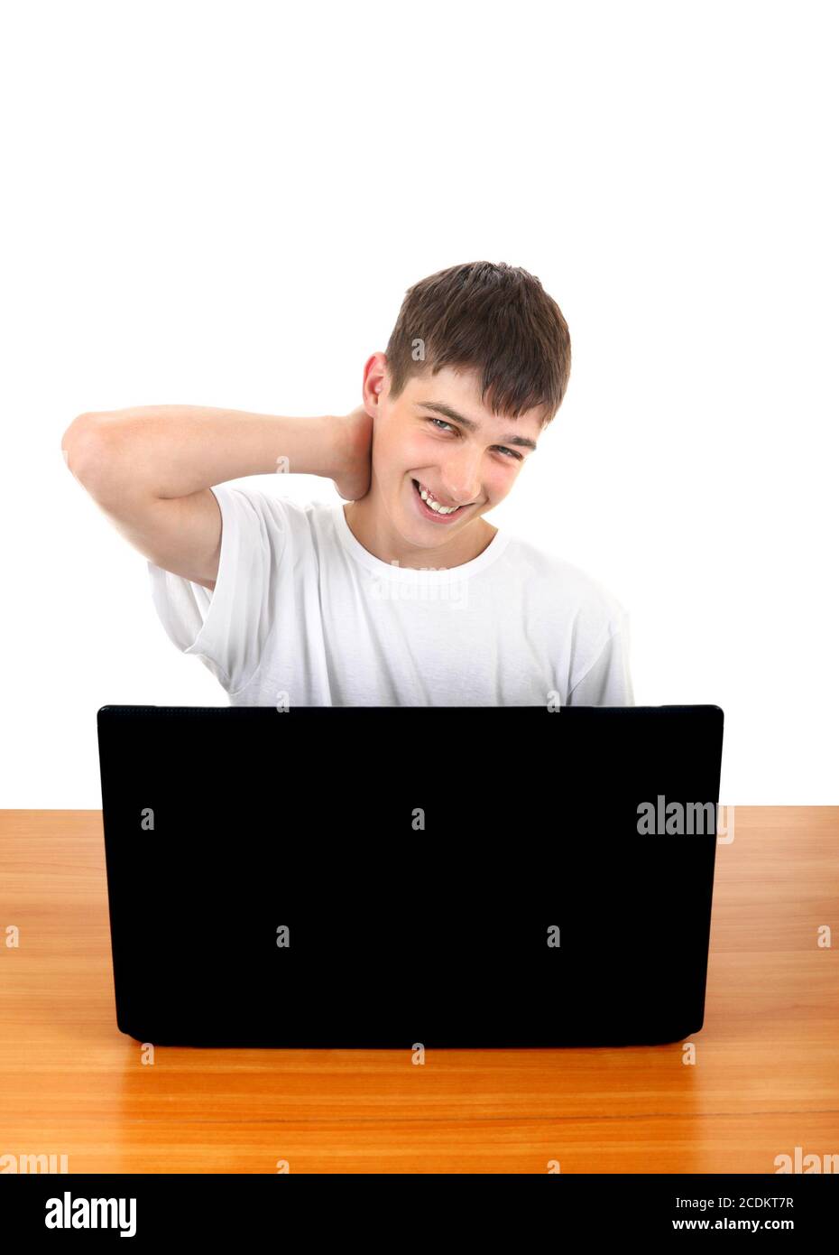 Teenager behind Laptop Stock Photo - Alamy
