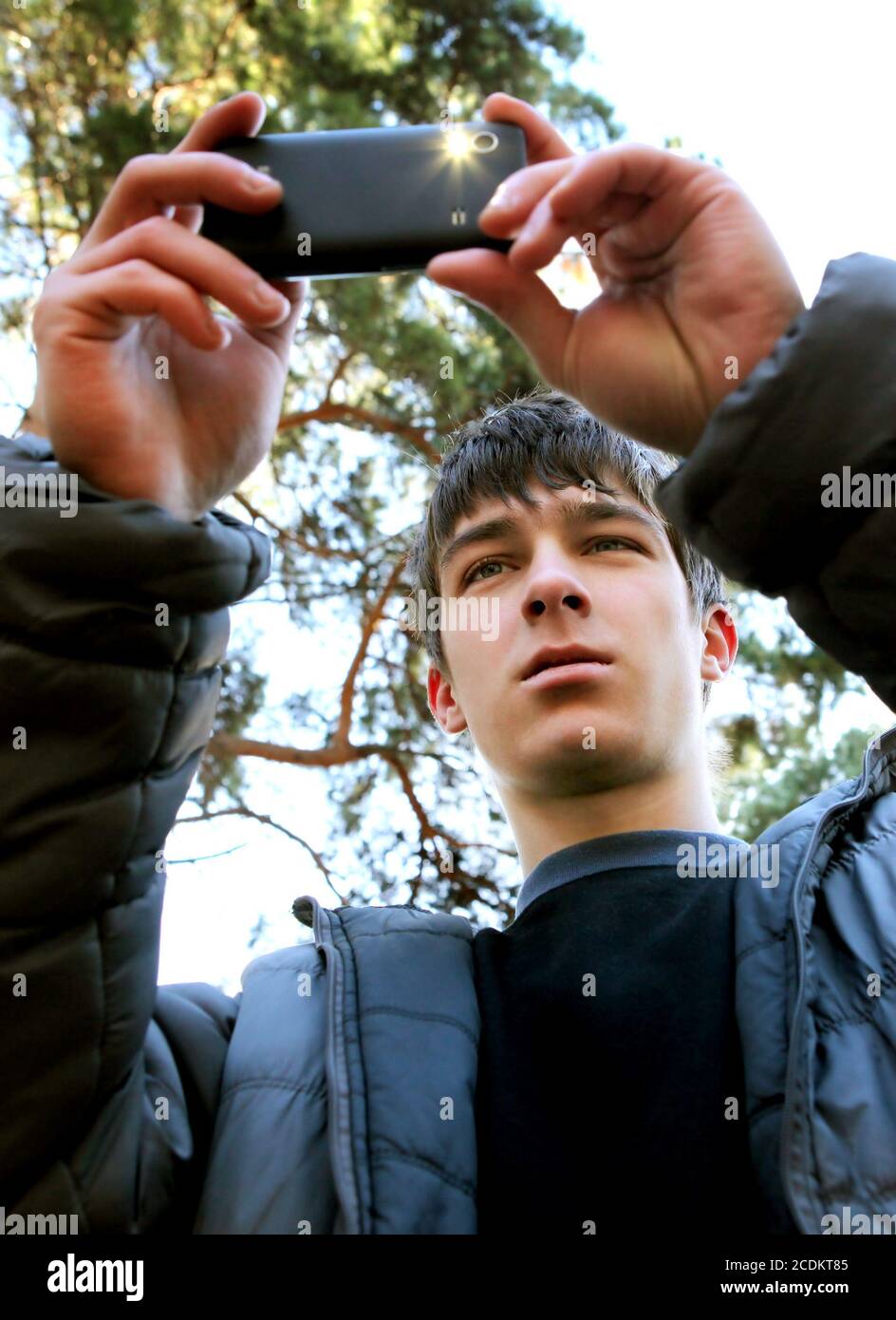 Teenager take a Photo with Cellphone Stock Photo - Alamy
