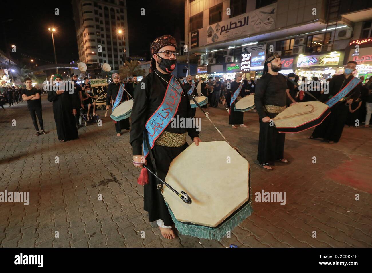 Baghdad, Iraq. 28th Aug, 2020. Shia Muslims play traditional drums ...