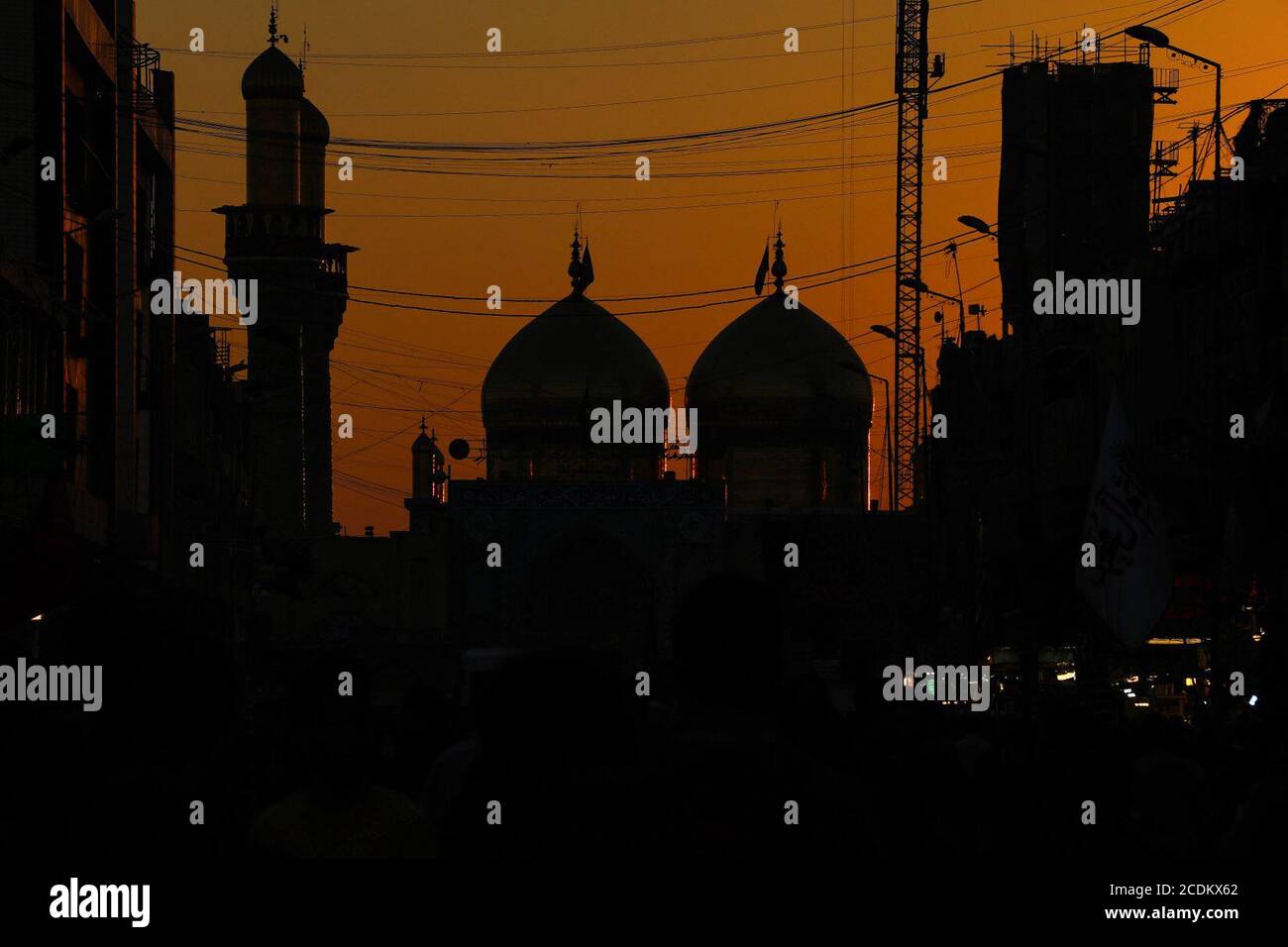 Baghdad, Iraq. 28th Aug, 2020. The sun sets behind Al-Kadhimiya Mosque ...