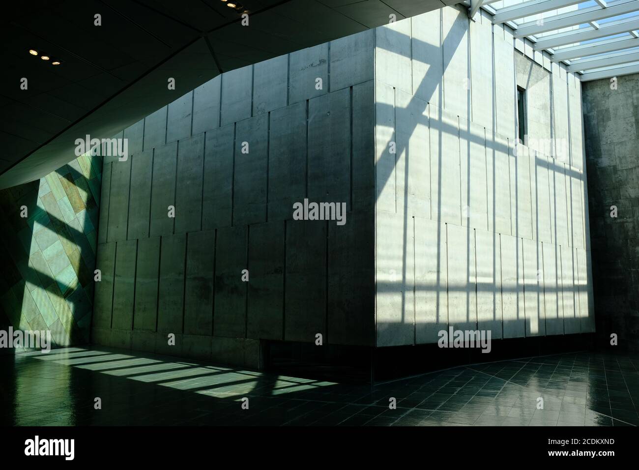 Inside the cool, dimly lit bunker-like atrium of the Canadian War ...