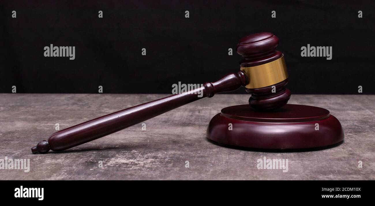 Judge's wooden gavel or auction mallet Stock Photo - Alamy