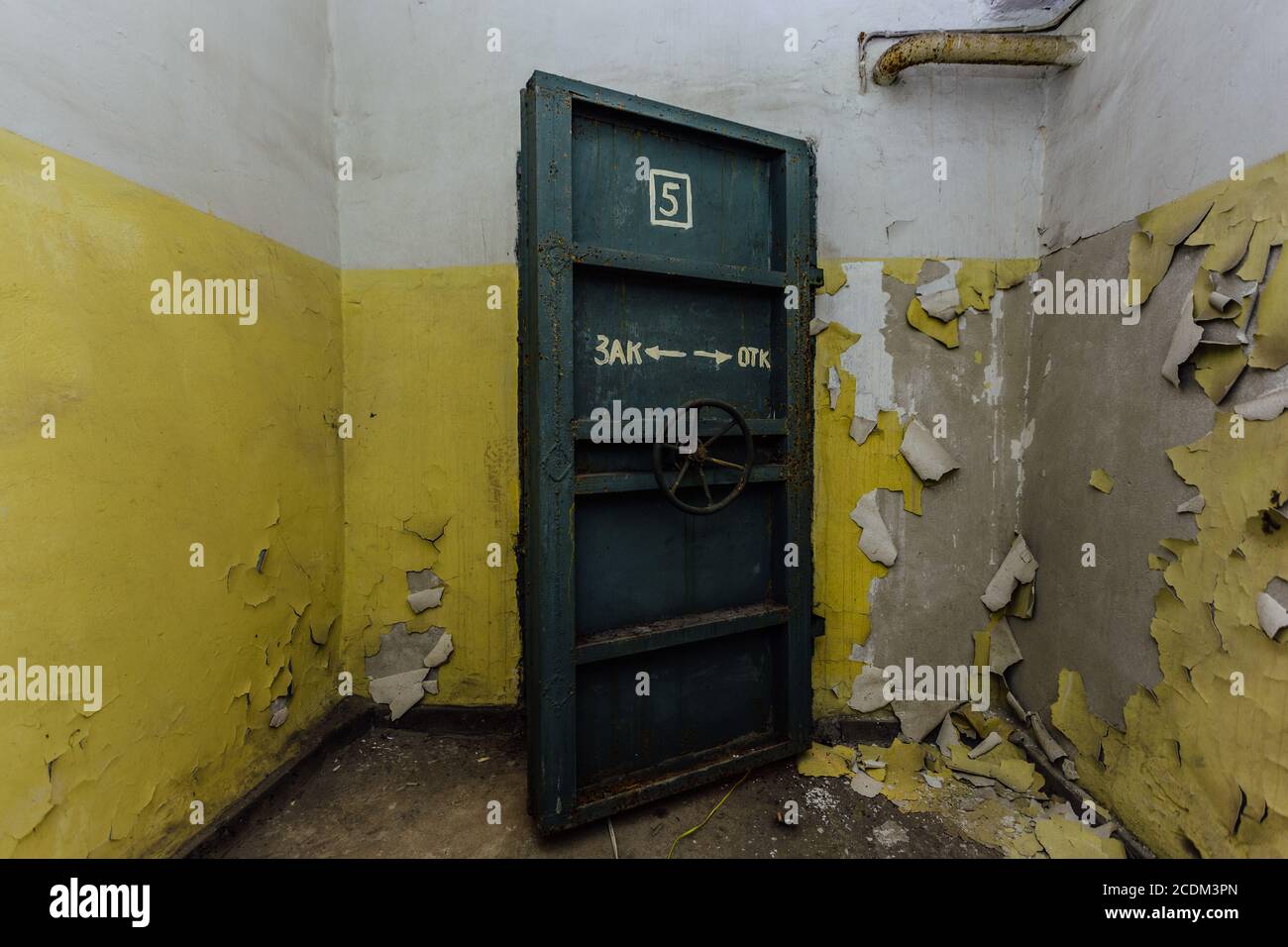 Opened heavy steel armored hermetic door in the Soviet bomb shelter ...