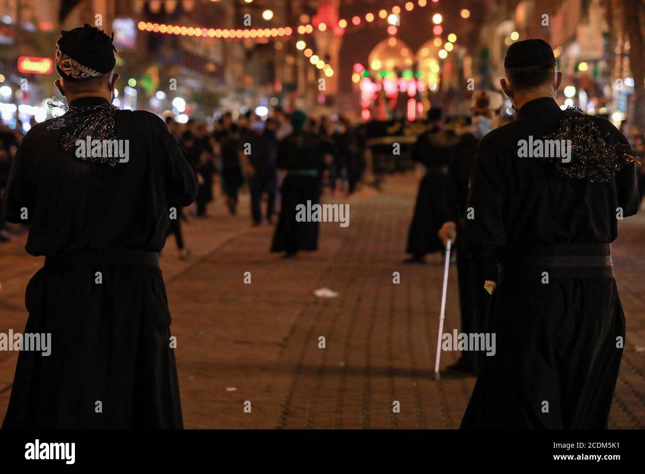 Bagdad, Iraq. 28th Aug, 2020. Shiite Muslims flagellate themselves with ...