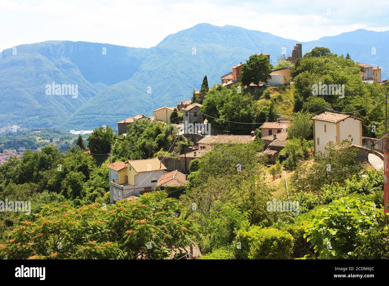 italian top view of an ancient medieval Tuscan village in the green of ...
