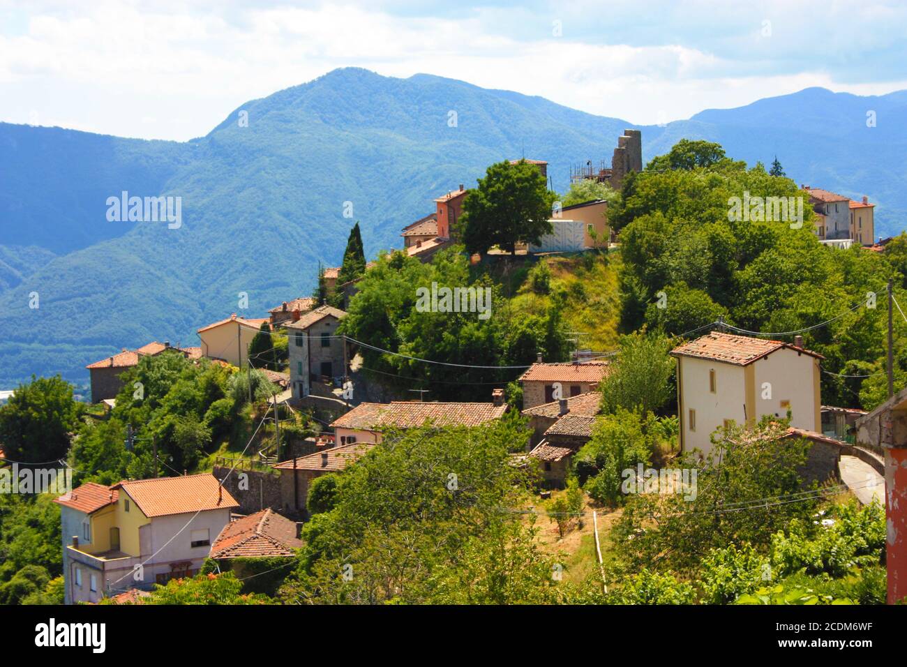 italian top view of an ancient medieval Tuscan village in the green of ...