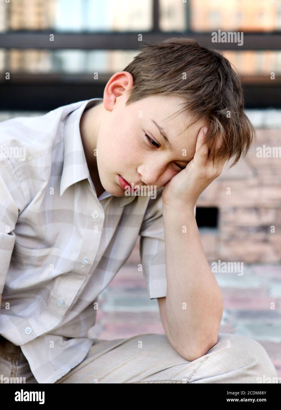 Sad Kid outdoor Stock Photo - Alamy