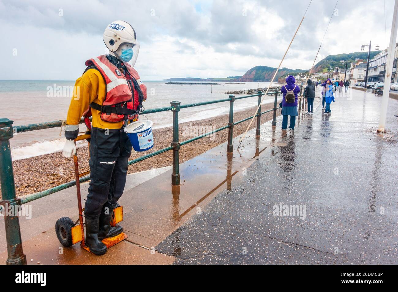 A mannequin dressed in RNLI lifeboat safety equipment, attached to a ...