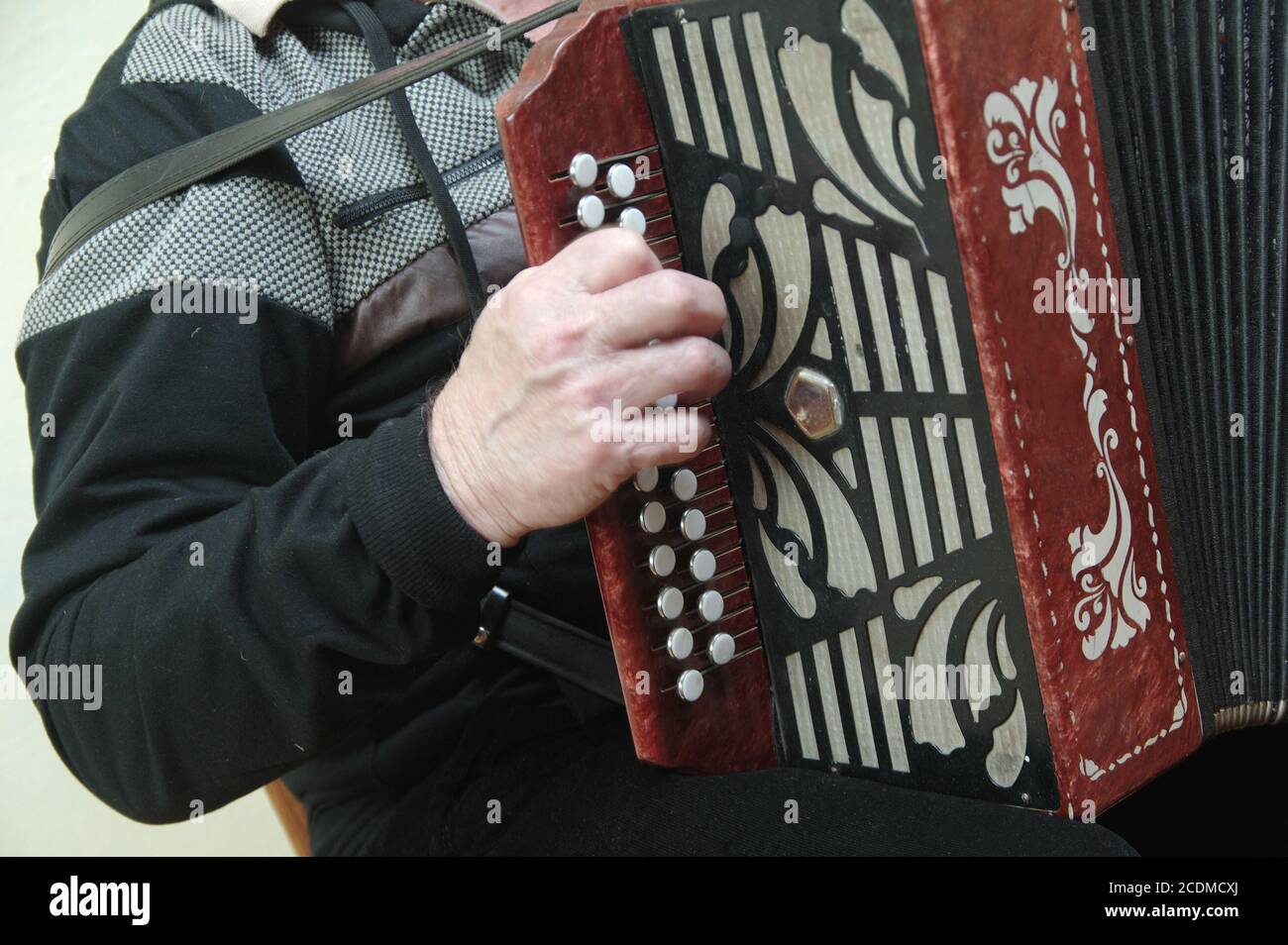 Man playing an accordion Stock Photo - Alamy