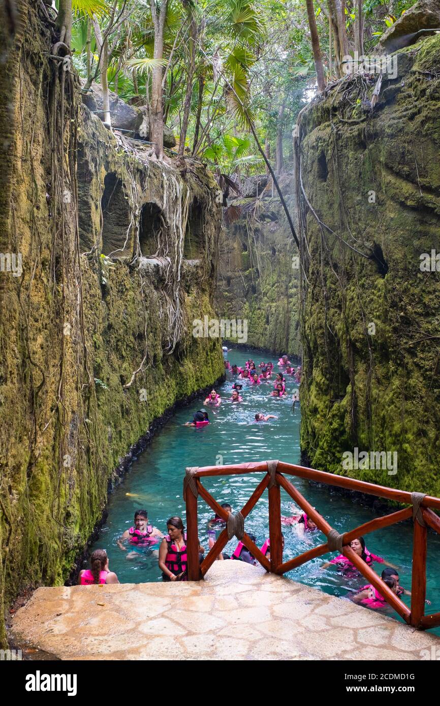 XCARET,MEXICO - APRIL 16,2019 : Visitors enjoying the underground river ...